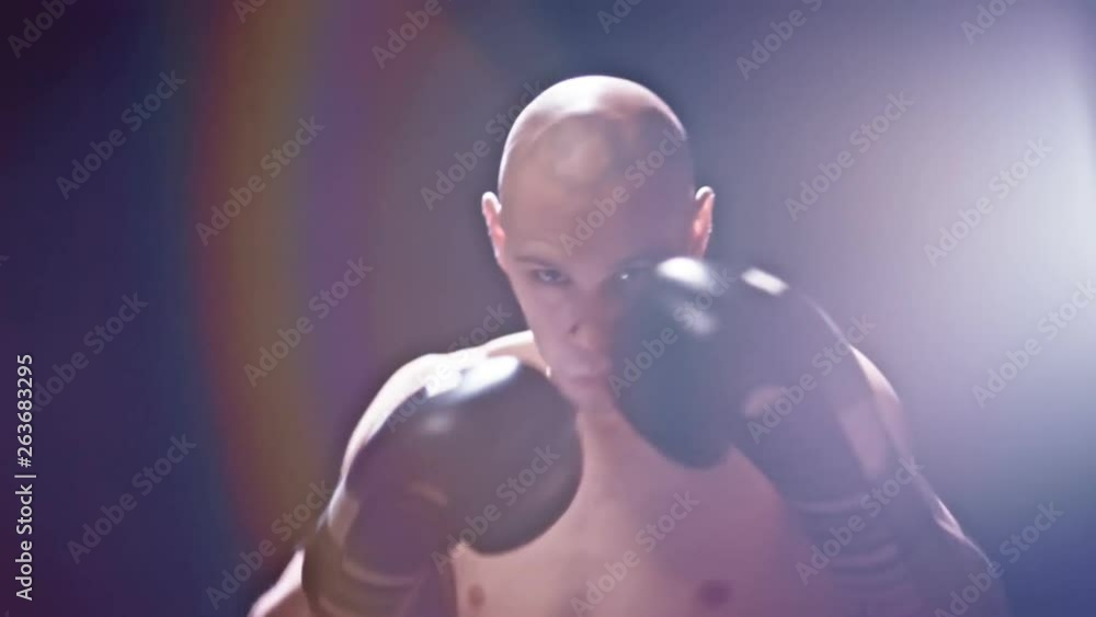Bald man in the gym fight with boxing gloves Stock ビデオ | Adobe Stock