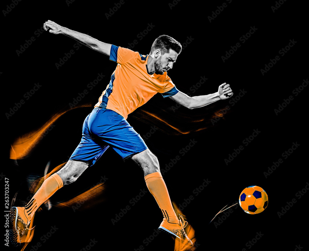 one caucasian soccer player man isolated on black background with light ...