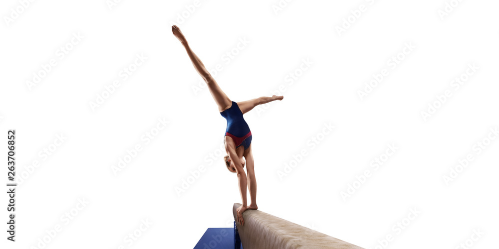 Female athlete doing a complicated exciting trick on gymnastics balance ...
