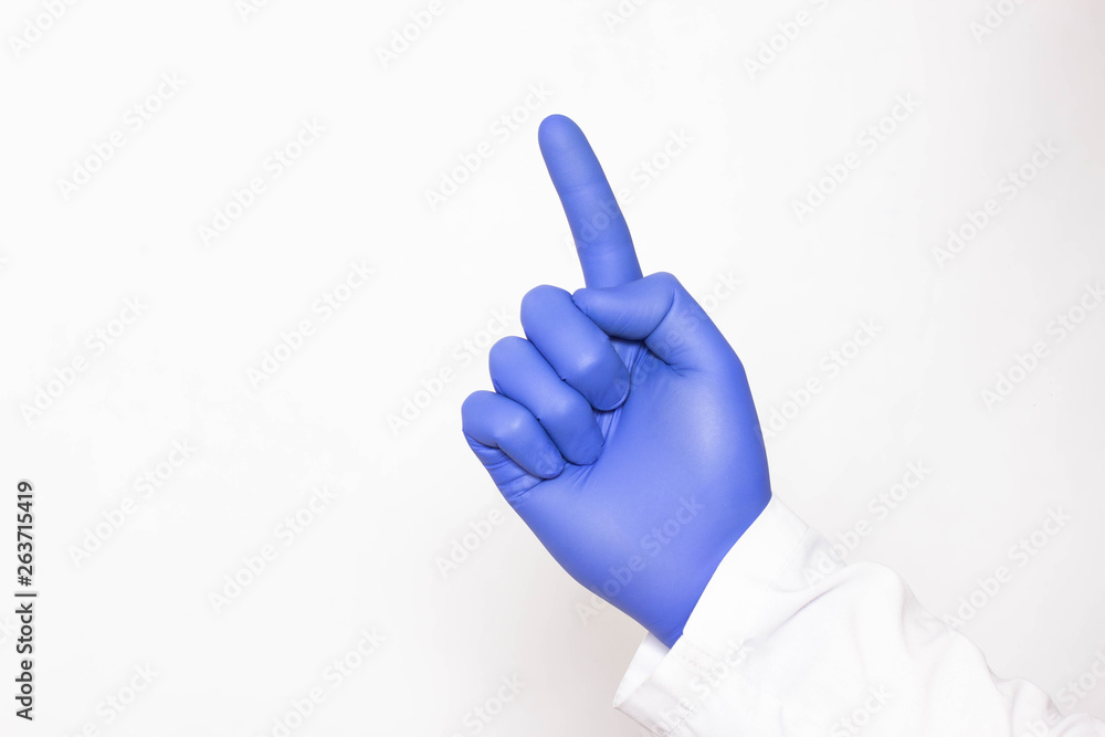 Gloved hand of doctor urologist on white background concept of ...