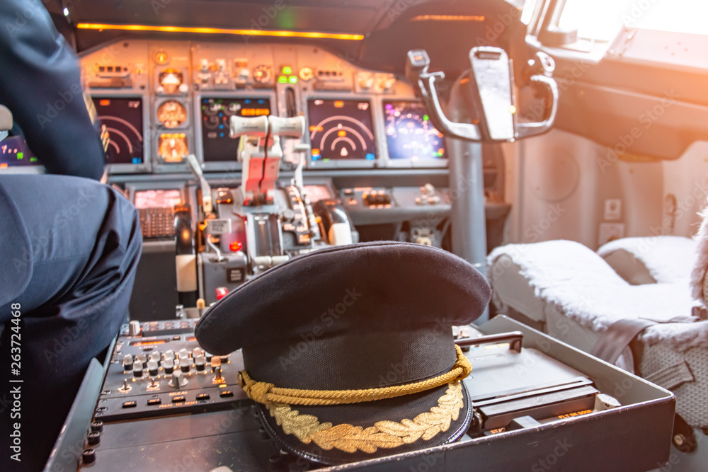Cap of the commander of the aircraft in the cockpit. Civil Aviation ...