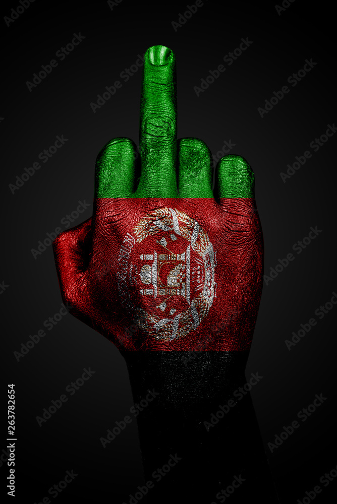 A hand with a painted flag of Afghanistan shows the middle finger, a ...