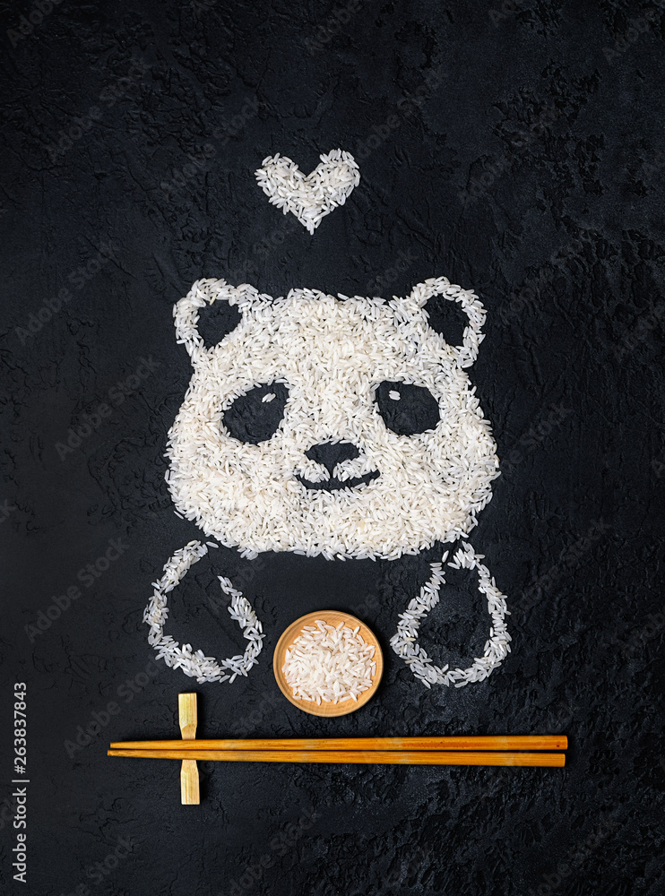 Panda, symbol of China, face made in rice on dark background. Asia ...