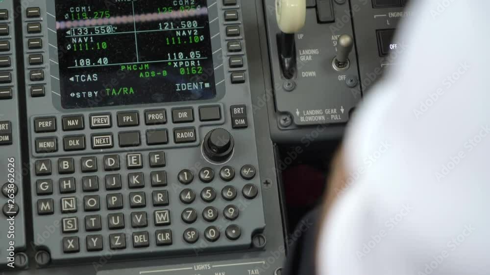 Flight Management System FMS instrument in cockpit of private jet ...