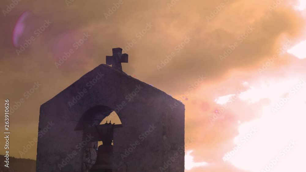 Time lapse of a Christian cross on a french steeple with apocalyptic ...