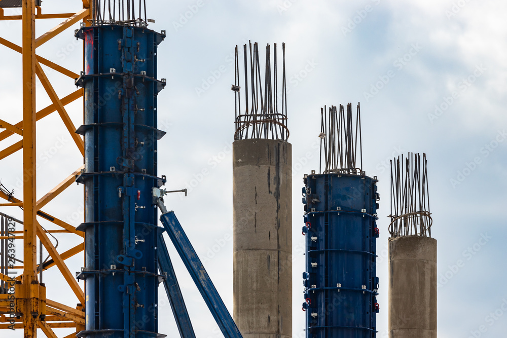 Formwork for pouring concrete .Concrete and iron pillars and frame on ...