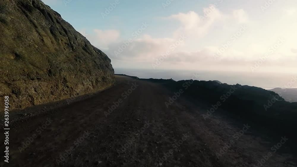 Travel and drive concept - long way off road viewed from car nose ...