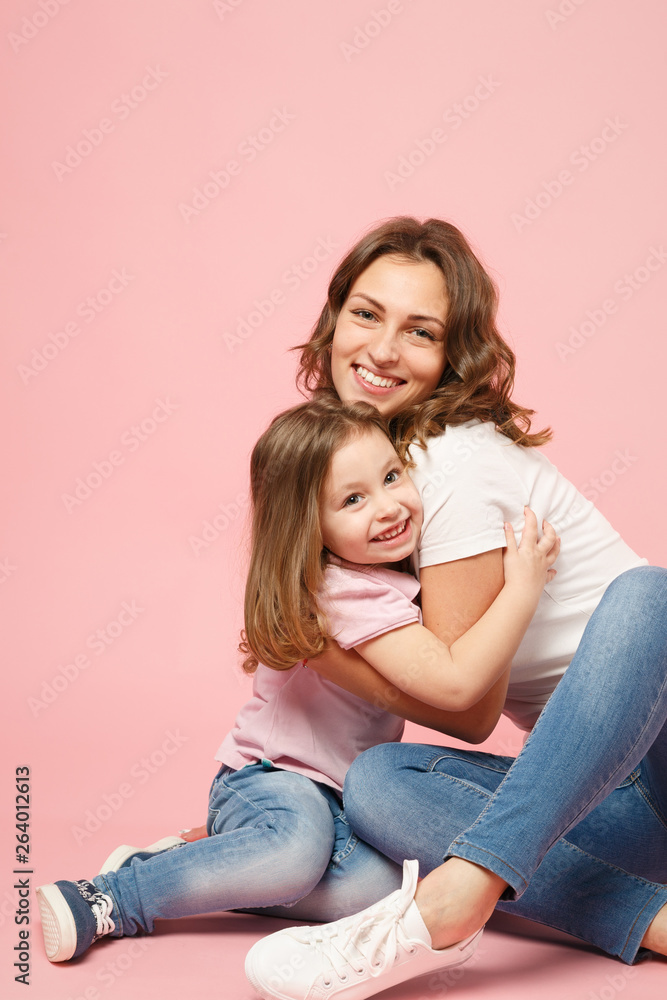 Woman in light clothes have fun with cute child baby girl. Mother ...