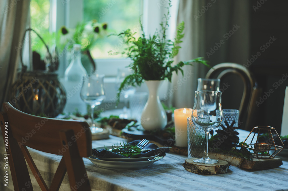 cozy evening family dinner in rustic style. Table summer setting in ...