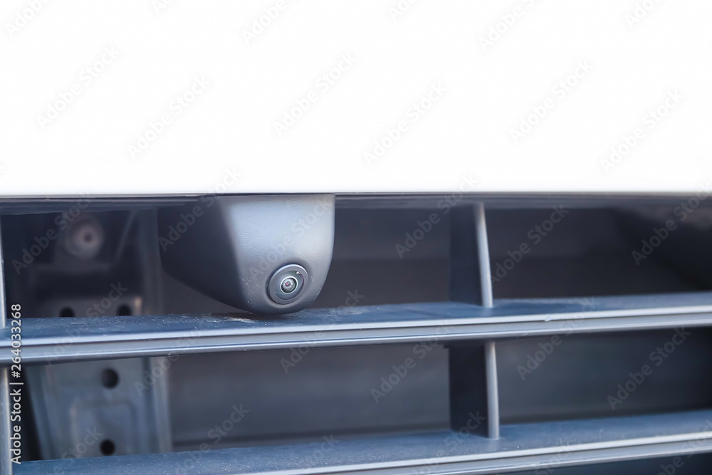 Closeup. Front view camera in the front bumper of the car. Circular 360 ...