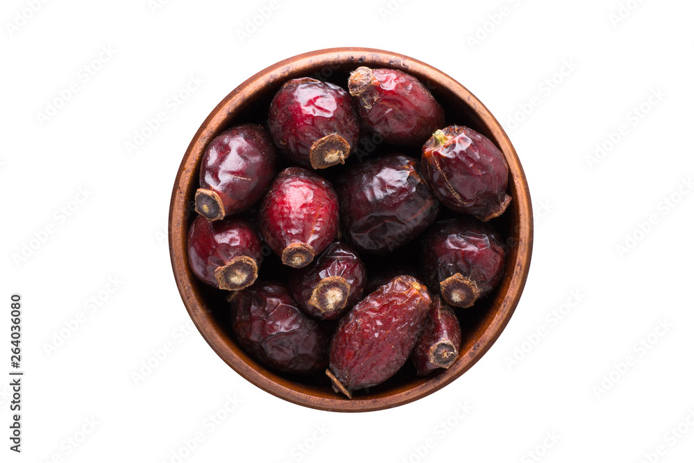 Dry berry Rose spice in wooden bowl, isolated on white background ...