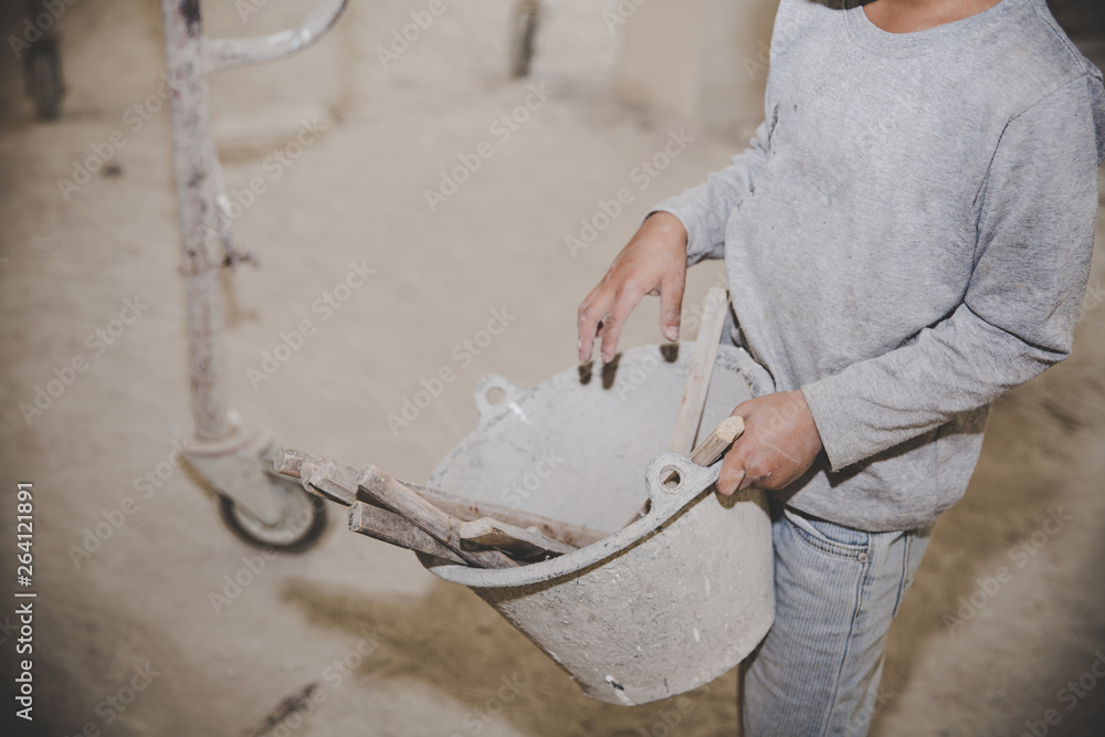 Little boys labor working in commercial building structure, World Day ...