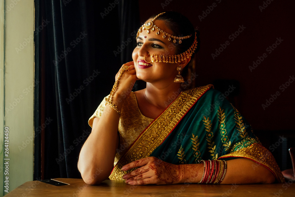 hindu princess lady in green traditional sari with tatoo mehndi and ...