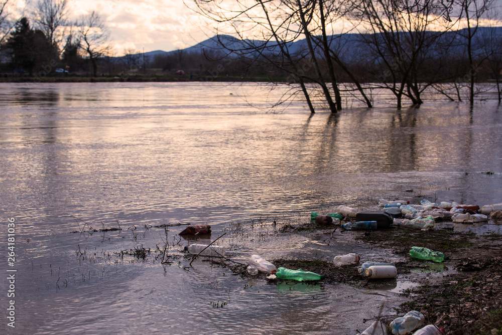 Garbage in the river Stock Photo | Adobe Stock
