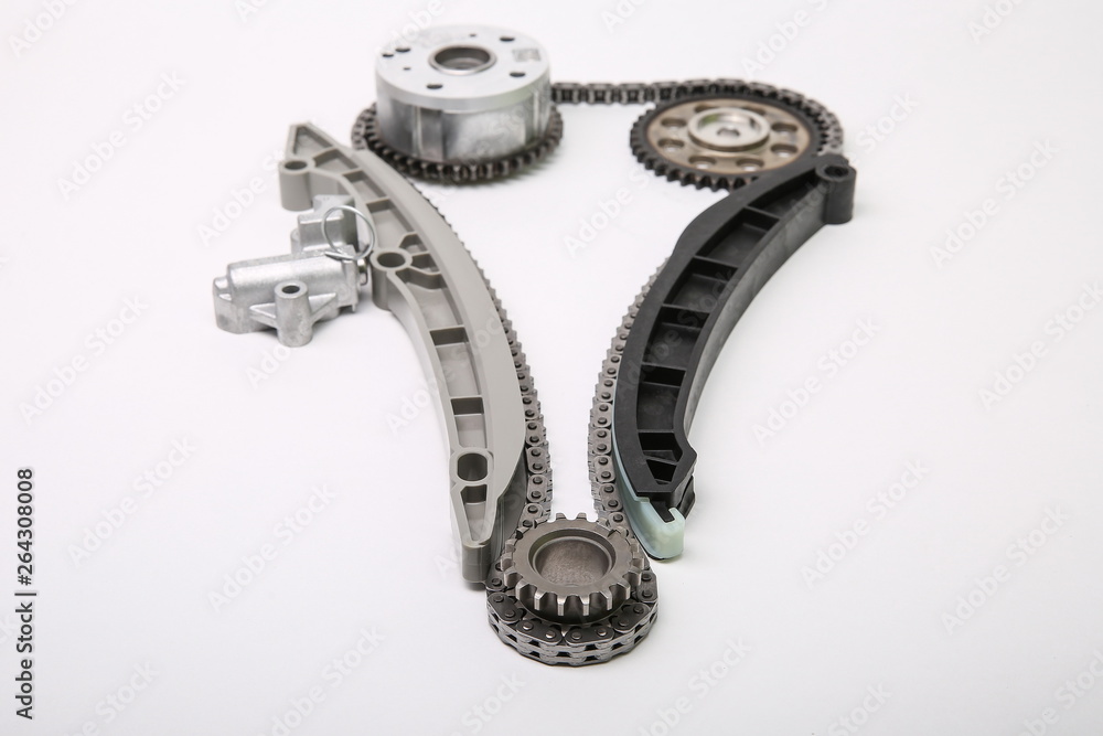 set of car engine timing chain isolated on white background. the gear ...