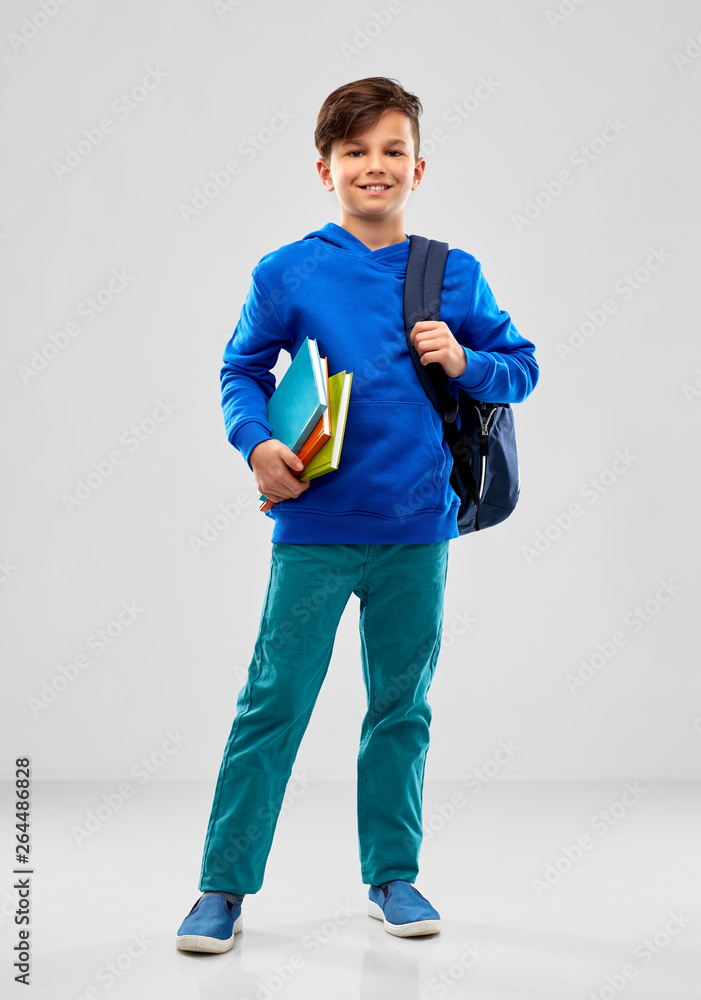 school, education and people concept - smiling student boy with books ...
