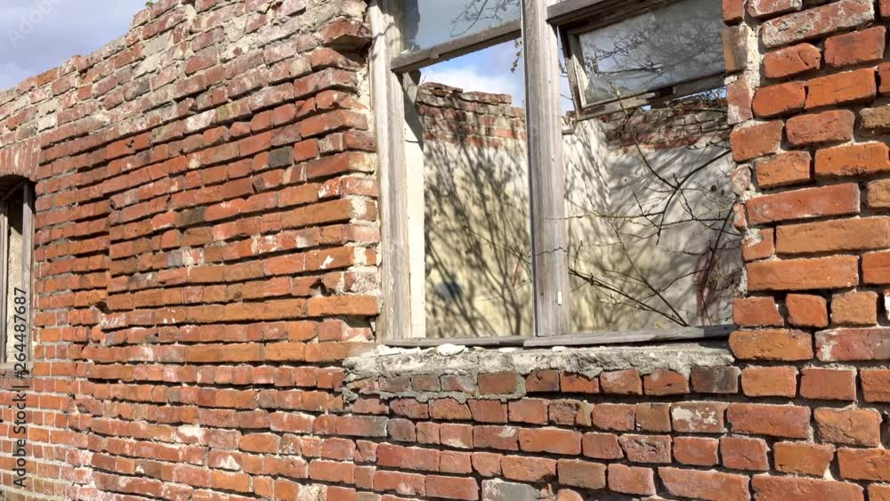 Wall of a red brick old house and it’s broken wooden window, Broken ...