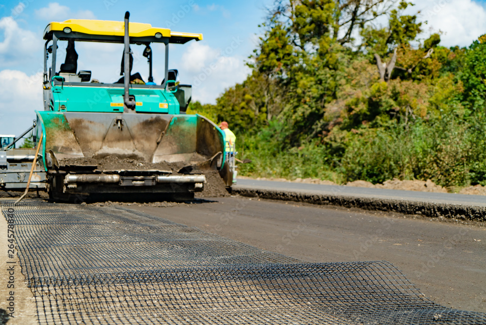 Tracked paver at asphalt pavement works Stock Photo | Adobe Stock