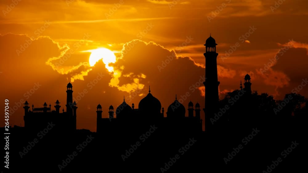 Badshahi Mosque: Time Lapse at Sunset with Red Sun and Clouds, one of ...