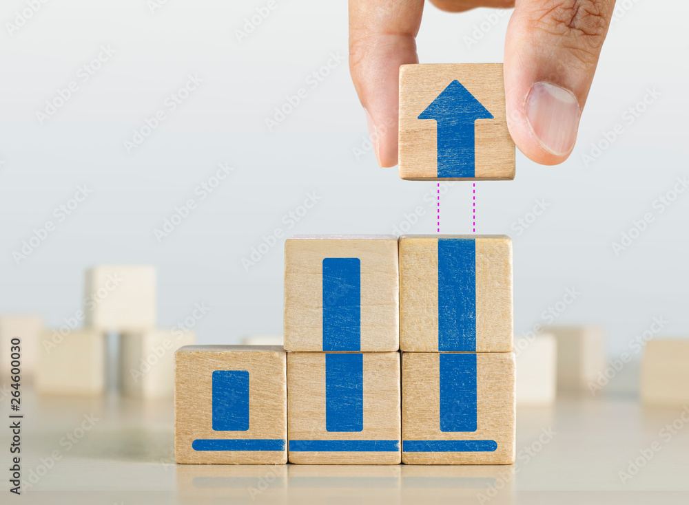 Business growth, progress or success concept. Wooden blocks with a ...