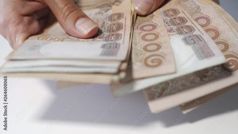 Close up hands counting of thousansds Thai baht money.Close up Human ...