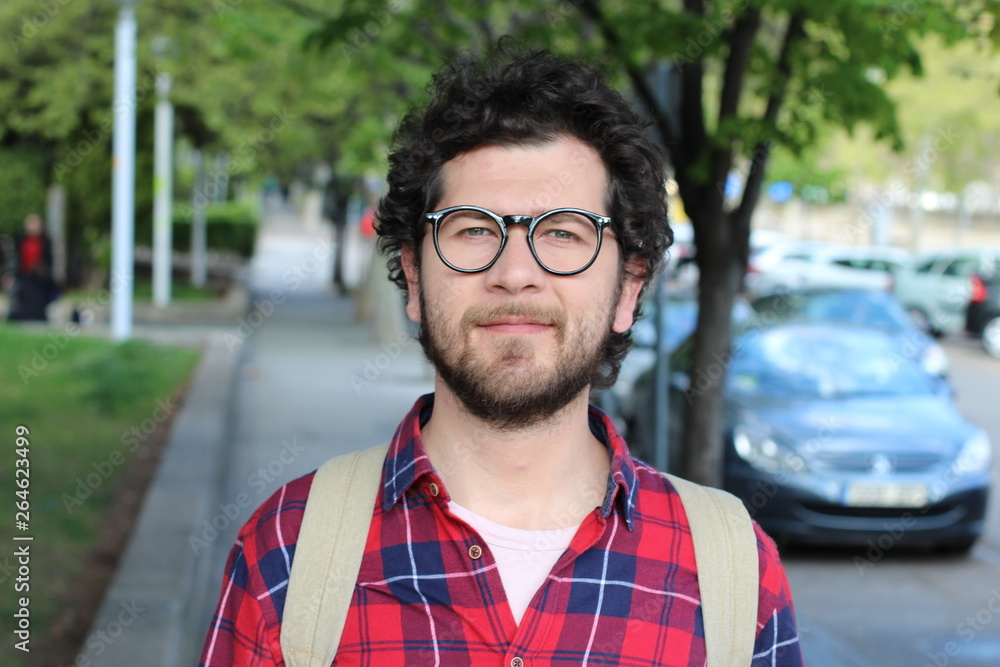 Foto de 30 years old nerd outdoors do Stock | Adobe Stock