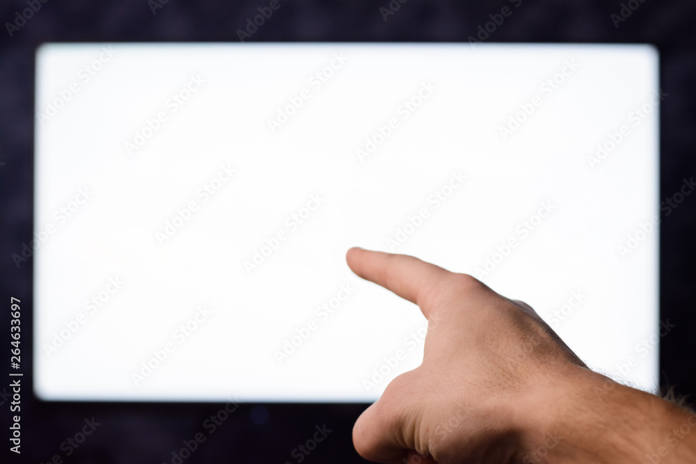 Angry TV viewer pointing to a screen of TV complaining of the poor ...