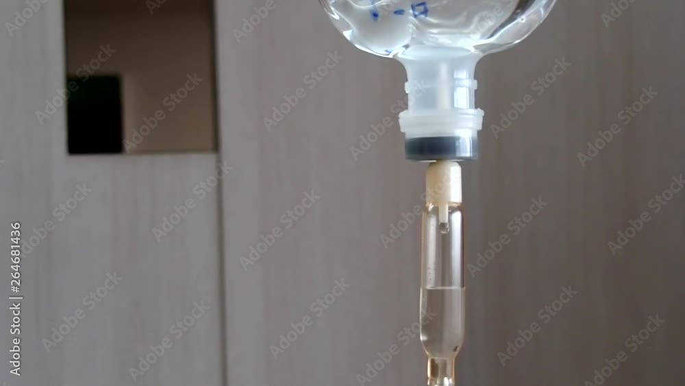 intravenous saline solution drop drip for treatment. Focus object ...