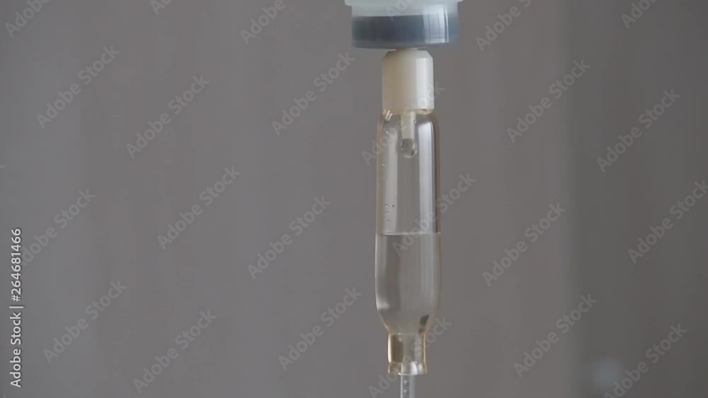 intravenous saline solution drop drip for treatment. Focus object ...