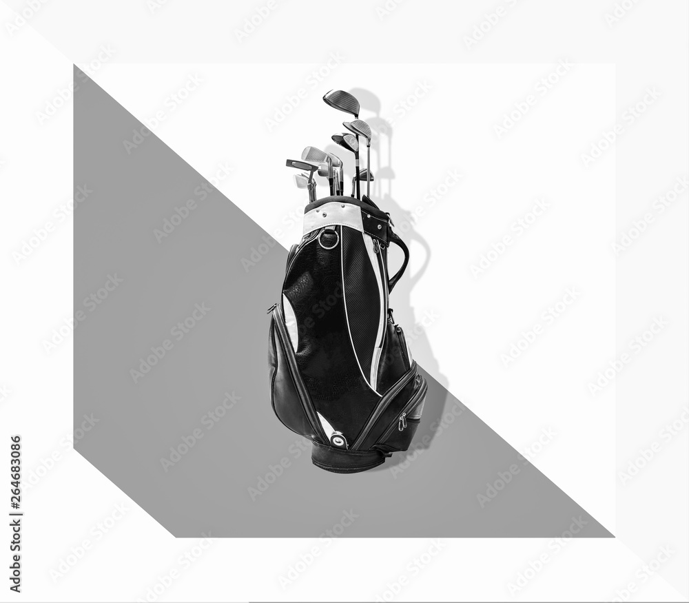 Golf equipment and black golf bag on black and white background, top ...
