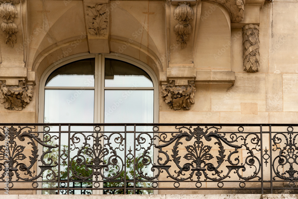 Window of one of the beautiful buildings along Champs Elysees avenue ...