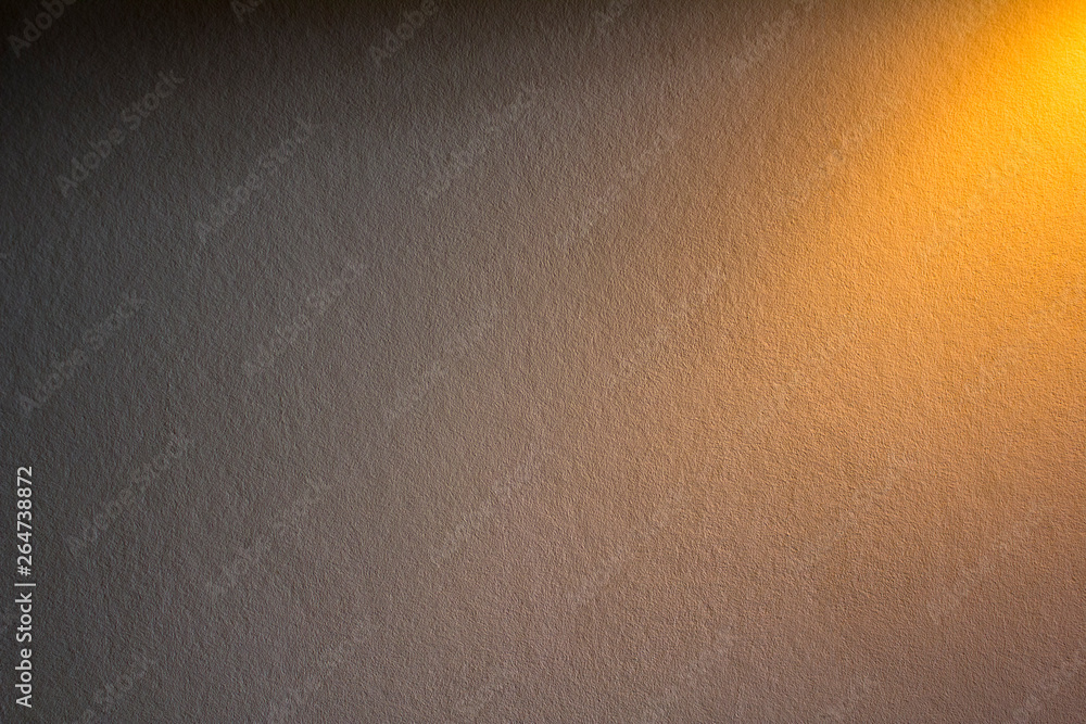 bright yellow light on a grainy white gray wall with shadows. rough ...