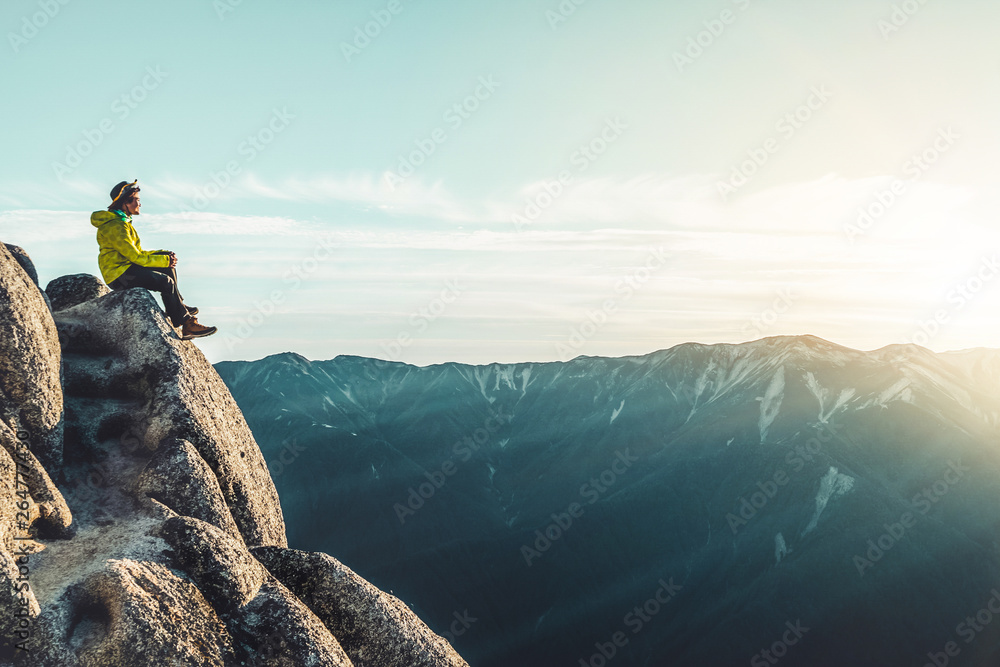 Epic adventure of brave and ambitious hiker trekking activity on wild ...