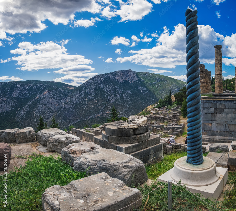 Tourists visit and enjoy views of the Serpent Column of Plataea and ...