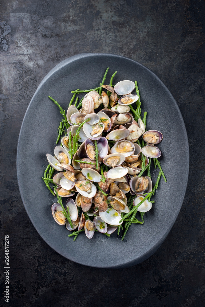 Steamed Japanese carpet shell with blanched green salicornia as top ...