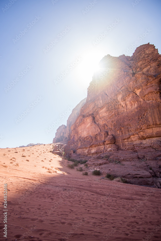 A beautiful day in the Jordanian desert of Wadi Rum. wide dessert with ...