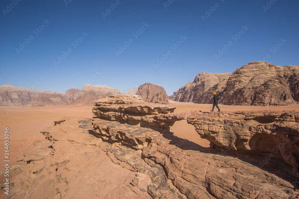 A beautiful day in the Jordanian desert of Wadi Rum. wide dessert with ...