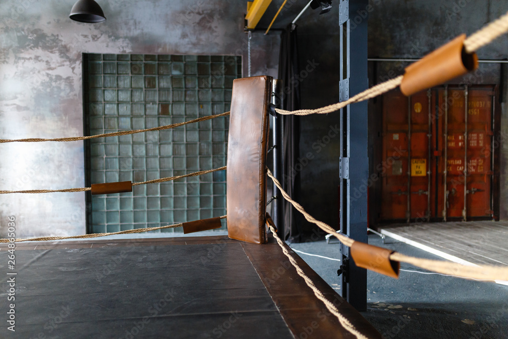 View of empty boxing ring in gym. Boxing corner braided Rope Boxing gym ...