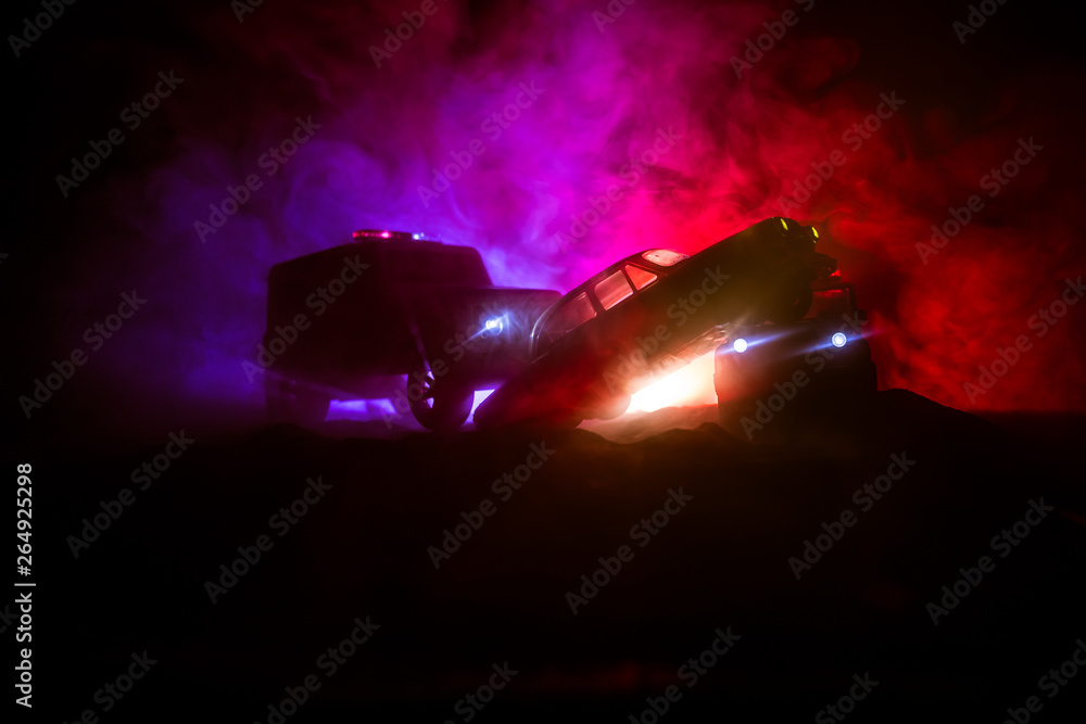Police car chasing a car at night with fog background. 911 Emergency ...
