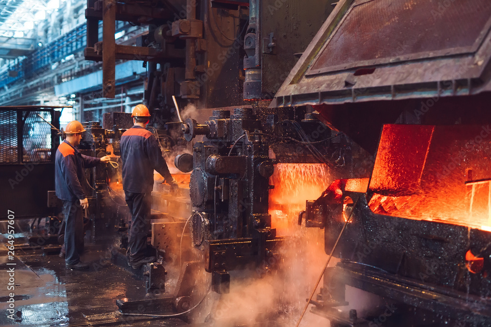 Workers in the steel mill. Stock Photo | Adobe Stock