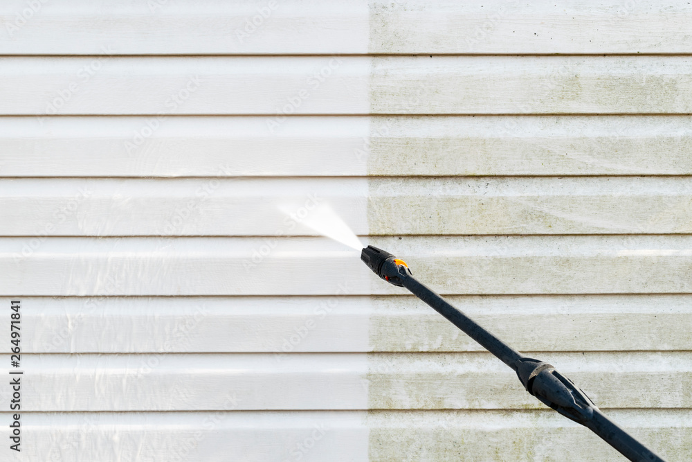 Cleaning service washing building facade with pressure water. Cleaning ...