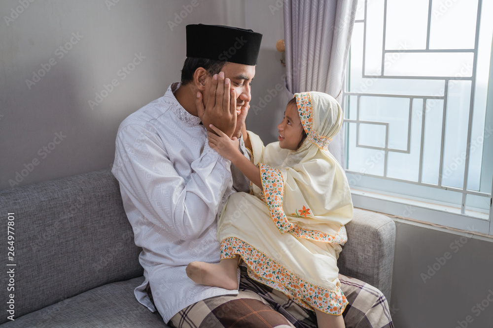 muslim asian dad teach her daughter how to pray with hand open Stock ...