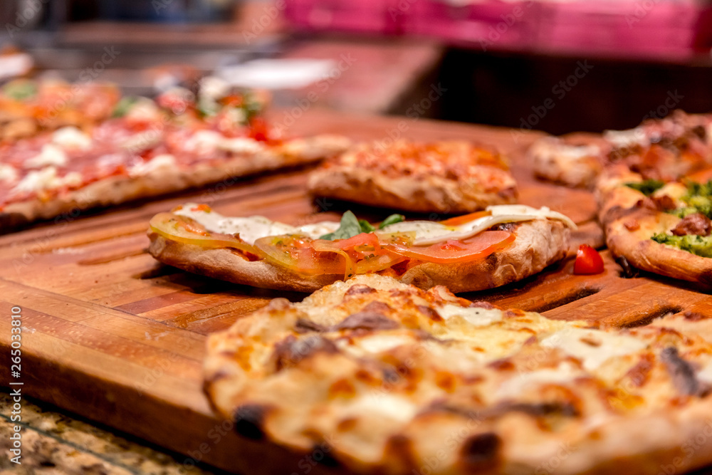 Authentic Italian pizza in a restaurant display window in Rome Stock ...