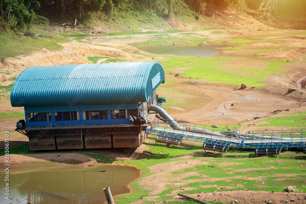 Crisis of water shortage in big dam ..Floating pump laying on the ...