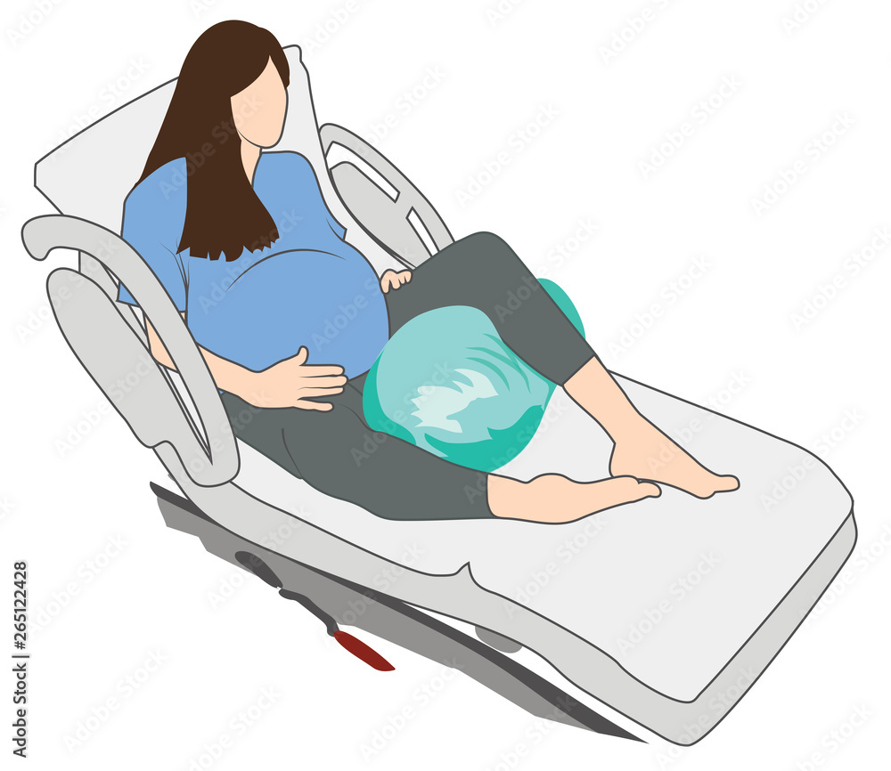 Pregnant woman in Pregnancy labor position w peanut ball on bed Stock ...