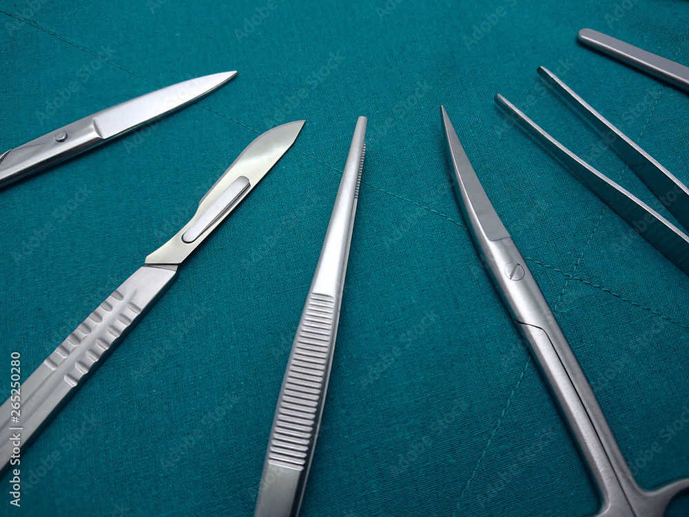 Surgical instrument, scalpel, tweezers, scissors, with liquid ...