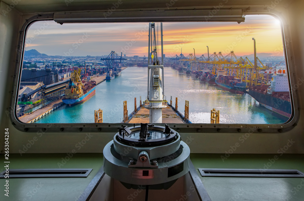 view from window bridge of the incoming ship arrival to an ...