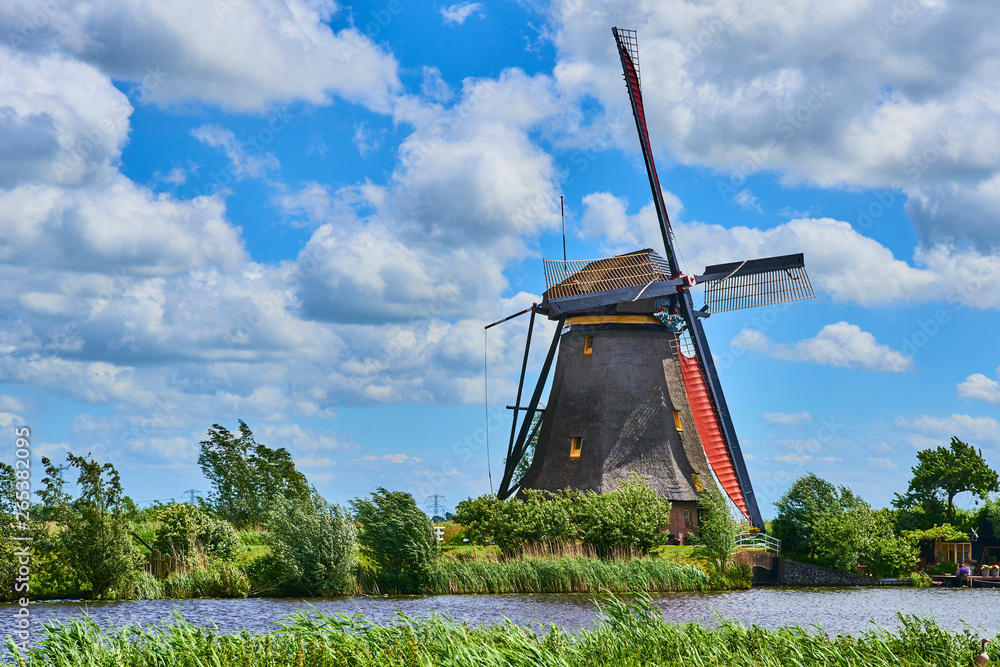 Netherlands rural lanscape with windmills at famous tourist site ...
