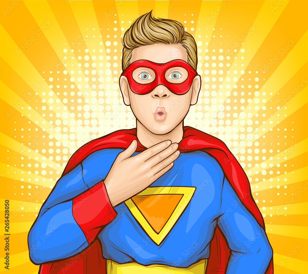 Confused and shocked caucasian boy in face mask and superhero blue suit ...