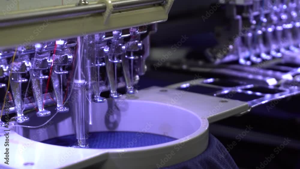Close-up footage of needle of embroidery machine of Garment ...